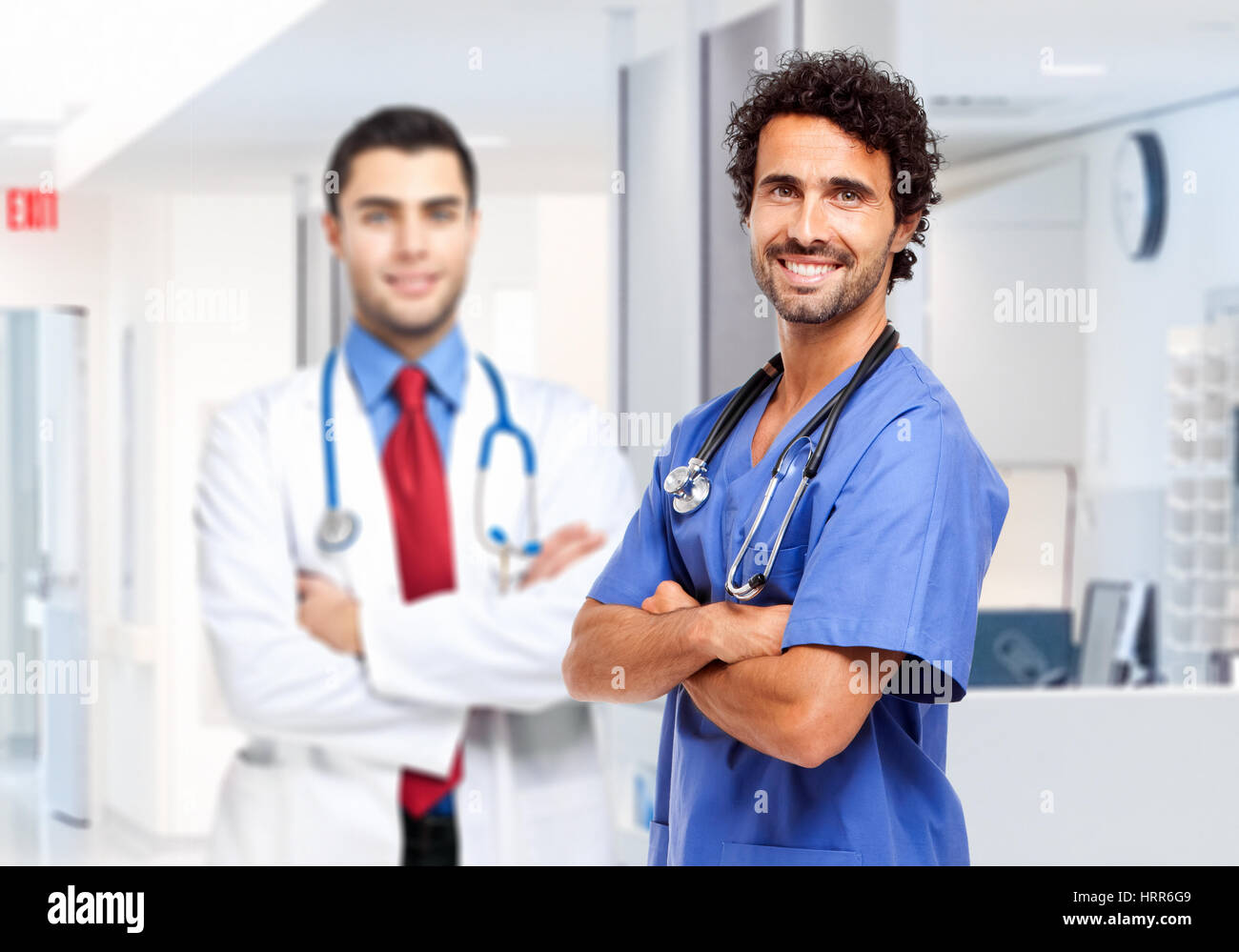 Two smiling male doctors Stock Photo - Alamy