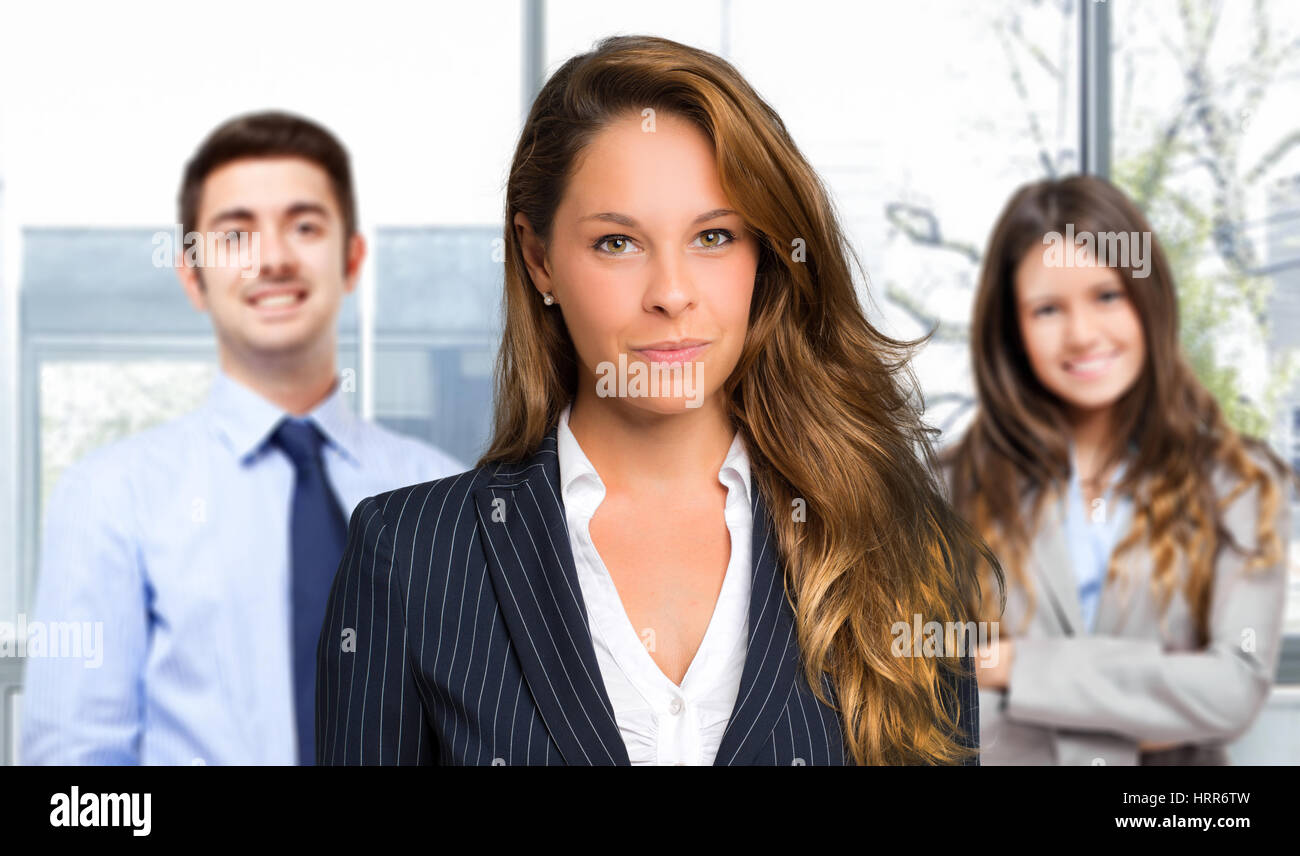 Portrait of happy business partners looking at camera Stock Photo - Alamy