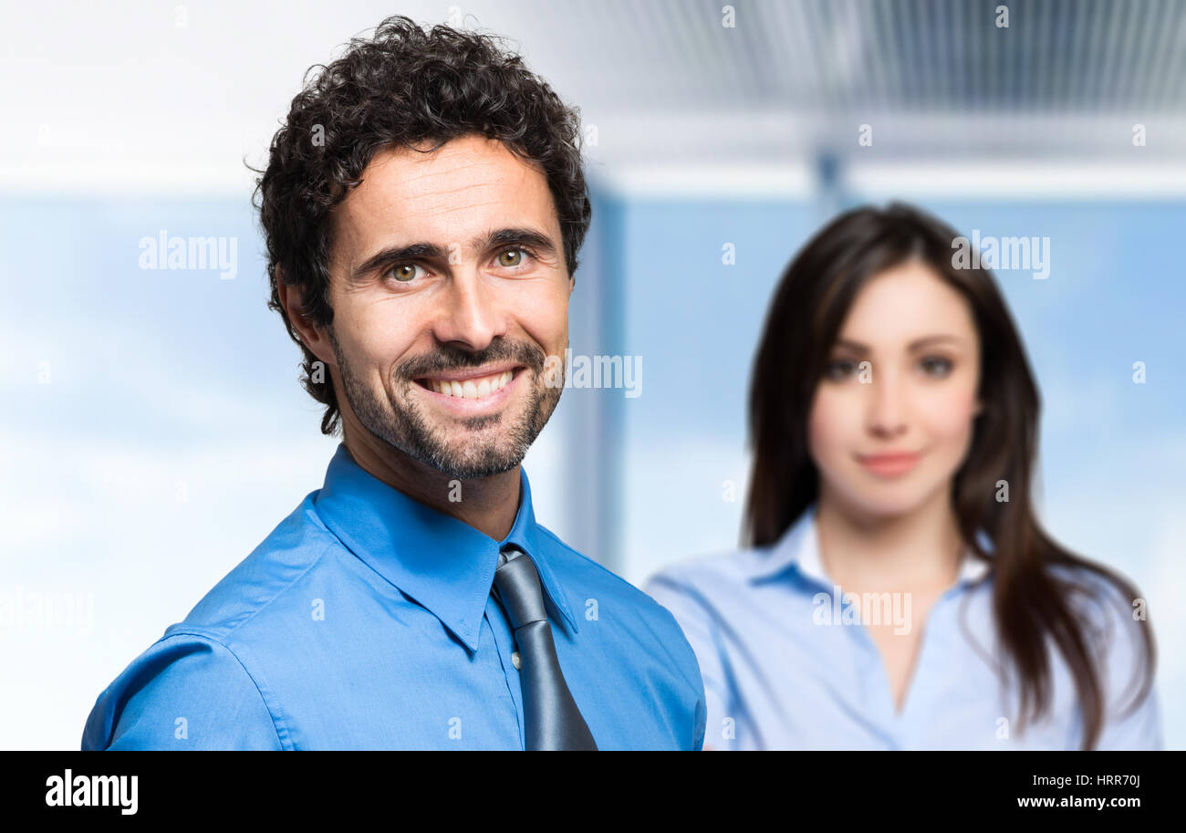 Portrait of smiling business people Stock Photo - Alamy