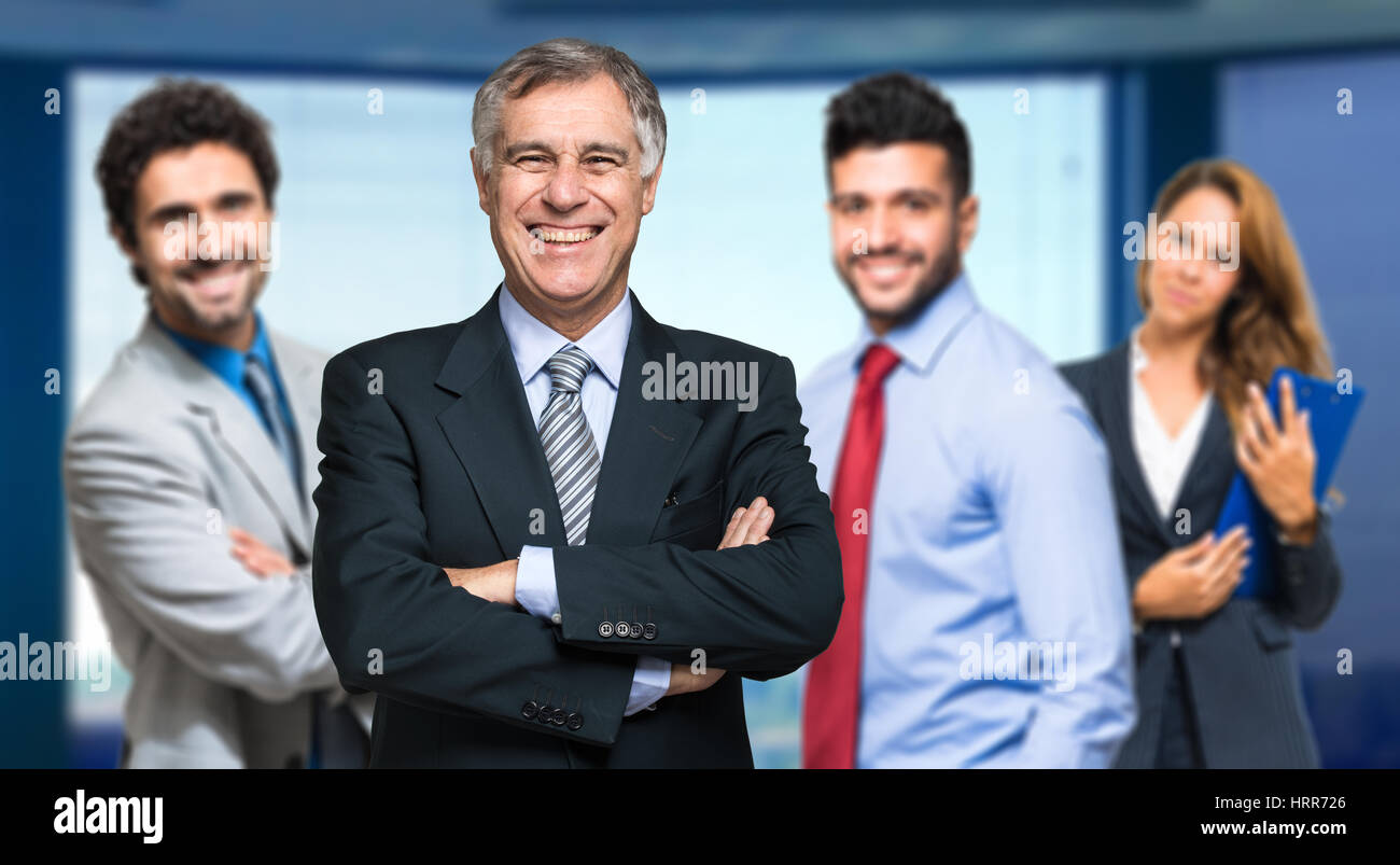 Group of friendly business people Stock Photo - Alamy
