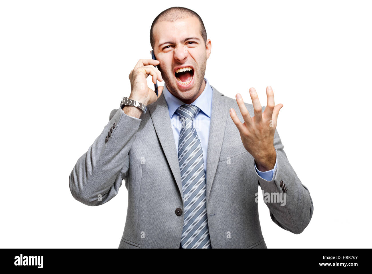 Angry business man screaming on mobile phone Stock Photo - Alamy