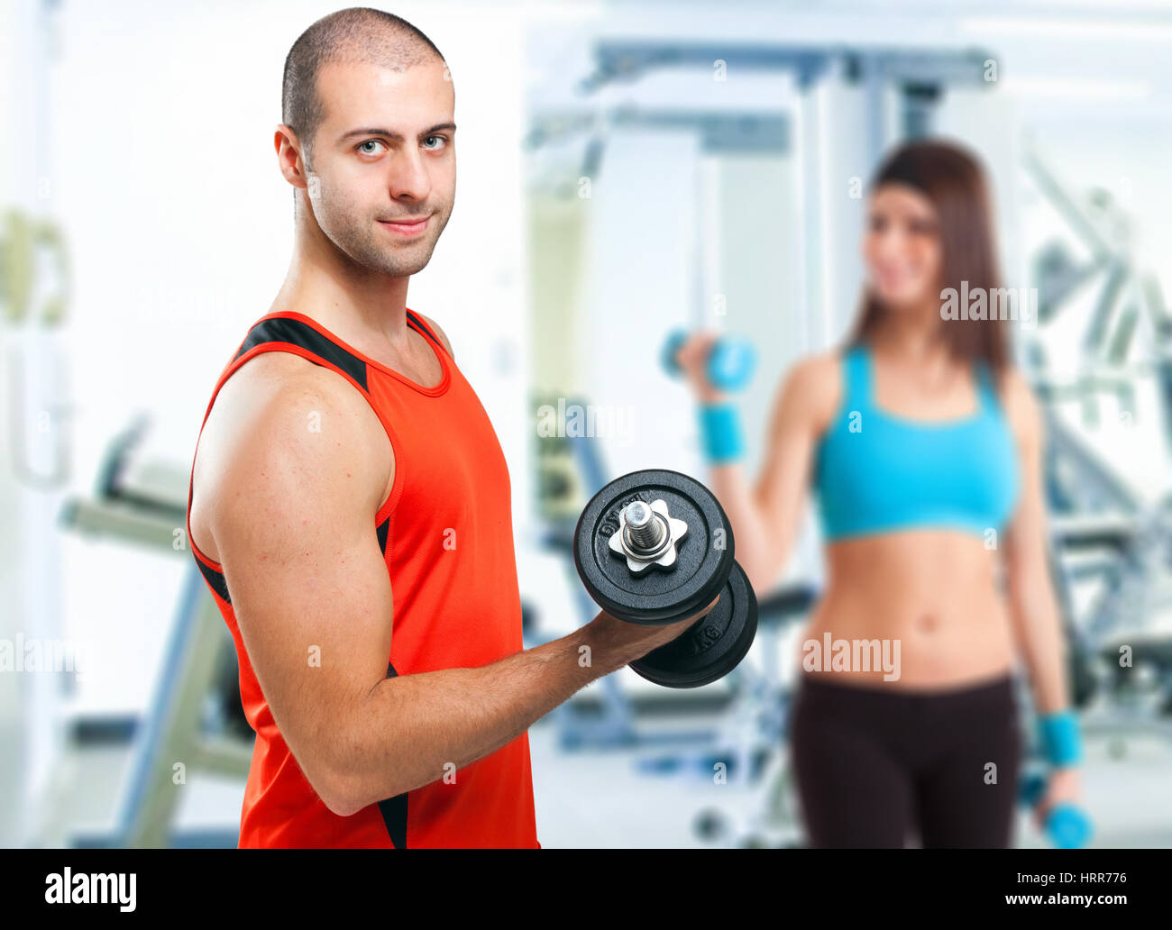 People working out in a gym Stock Photo - Alamy