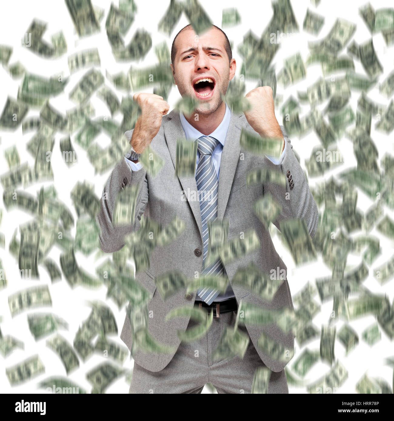 Happy man enjoying the rain of money Stock Photo - Alamy