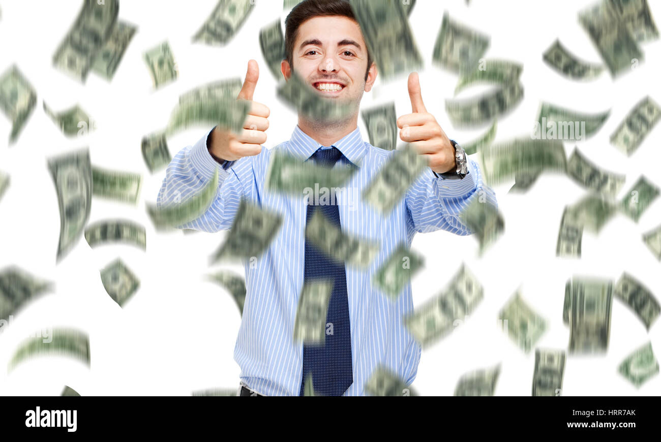 Happy man enjoying a rain of money Stock Photo - Alamy