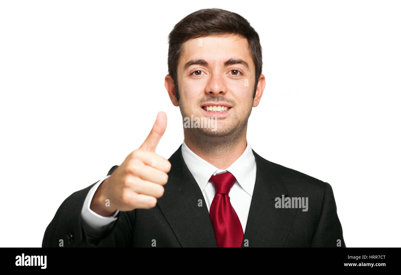 Happy handsome businessman giving thumbs hi-res stock photography and ...