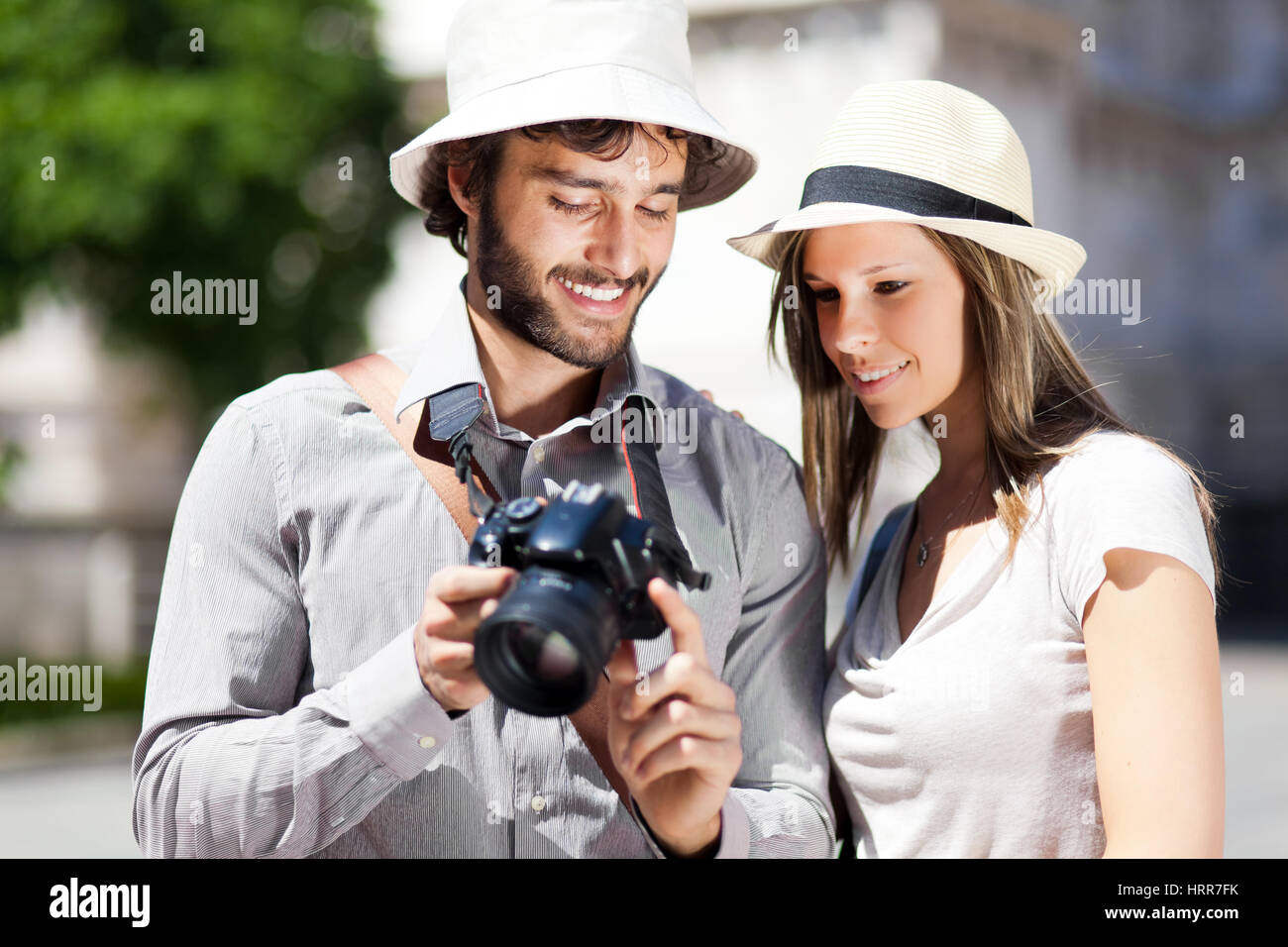 Two happy tourists planning hi-res stock photography and images - Alamy