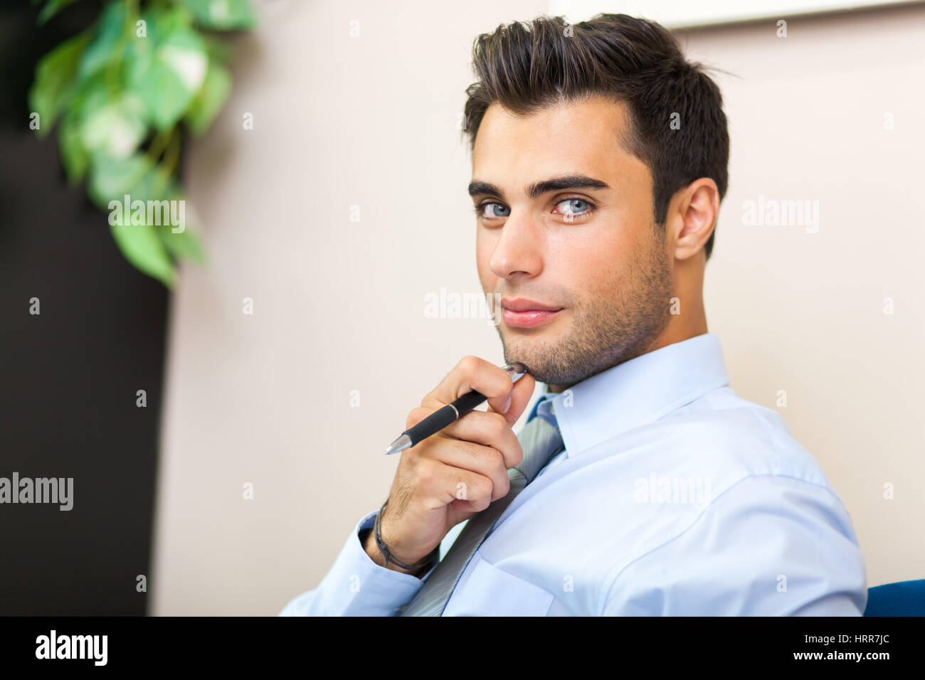 friendly young businessman Stock Photo - Alamy