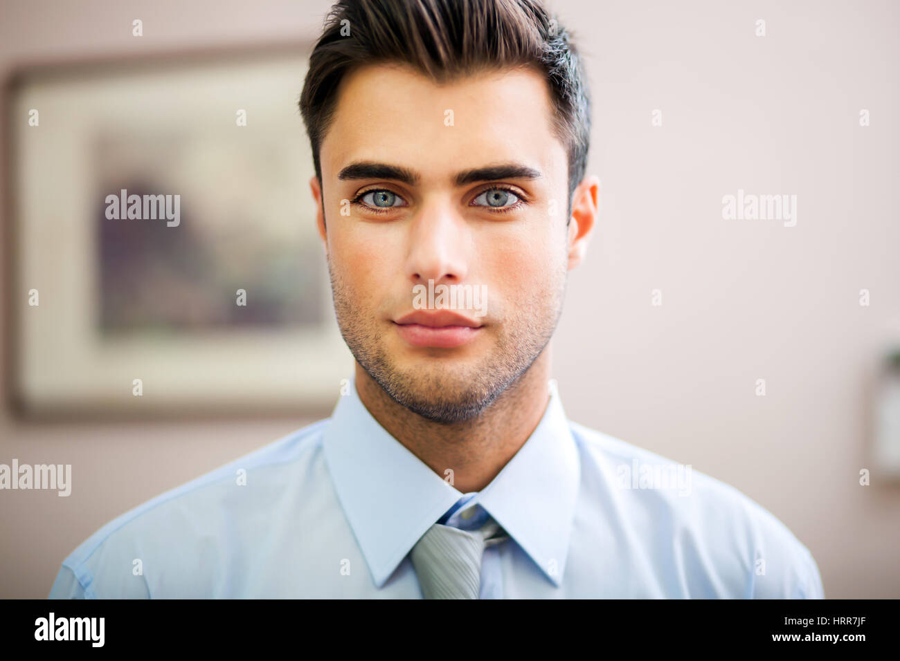 friendly young businessman Stock Photo - Alamy