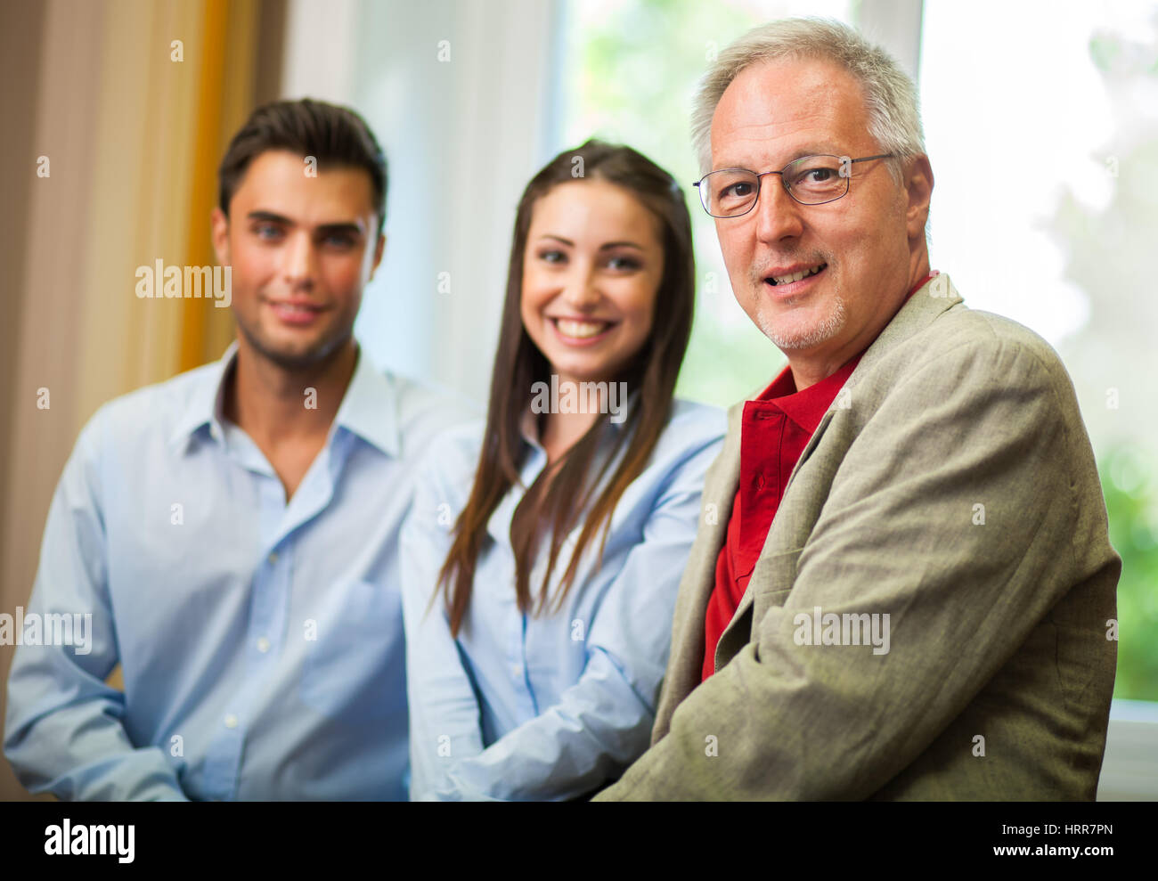 Portrait of business people in their office Stock Photo - Alamy