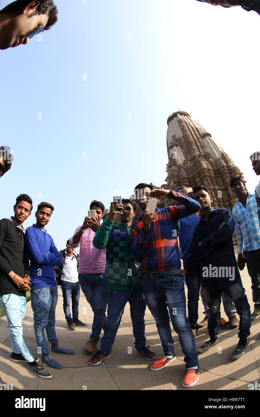 group of people clicking a selfie in the wester group of temple in ...