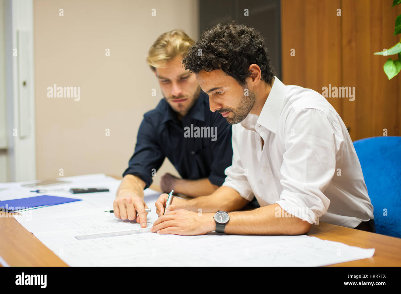 People at work in their office Stock Photo - Alamy
