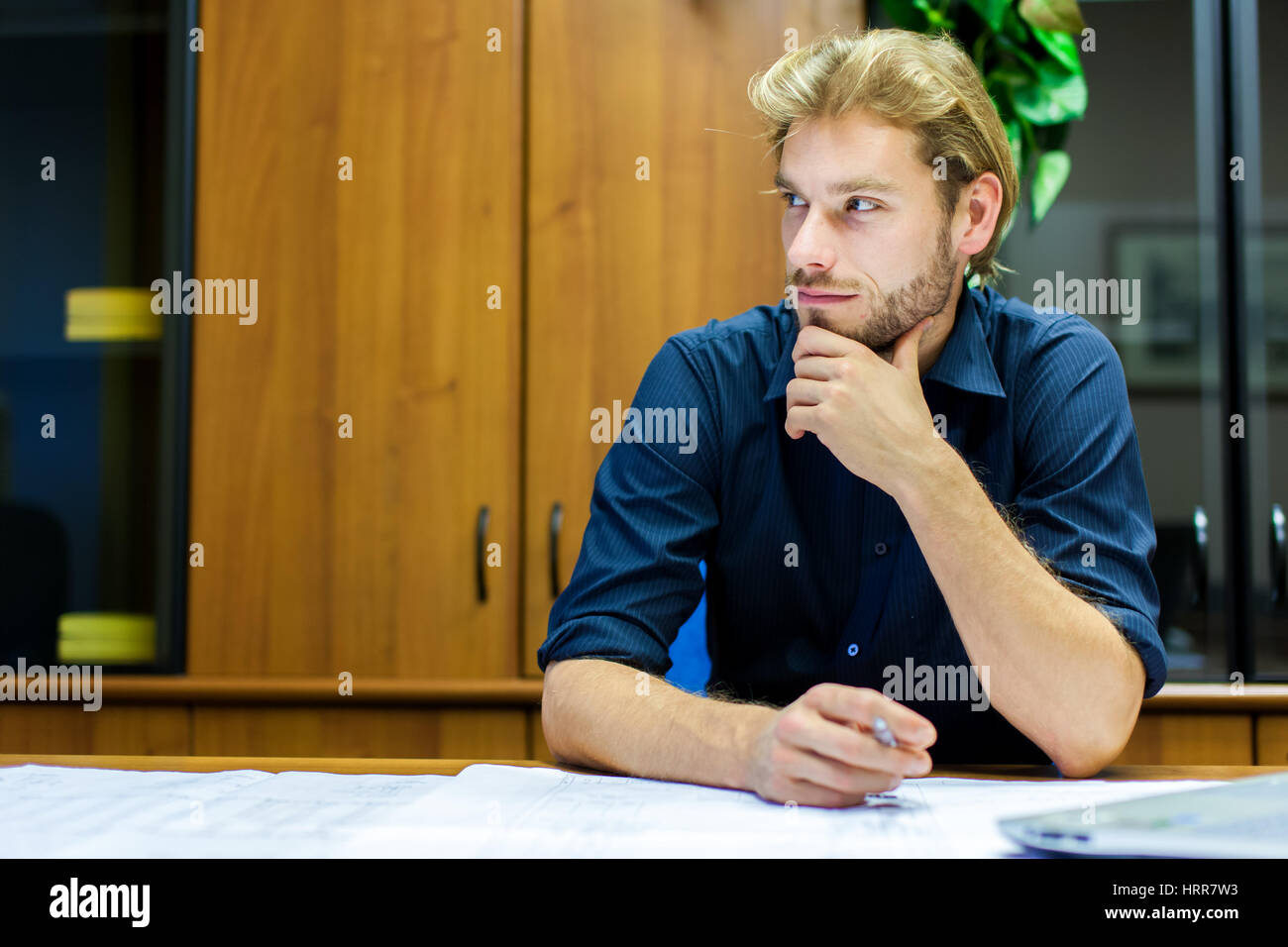 Portrait of an engineer in his office Stock Photo - Alamy