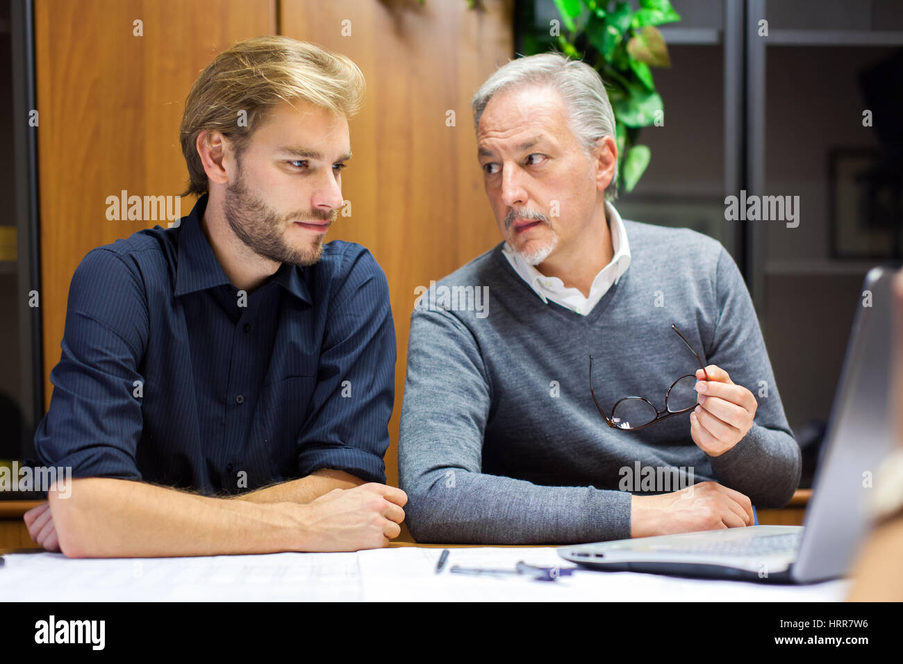 Two employees at work in an office Stock Photo - Alamy