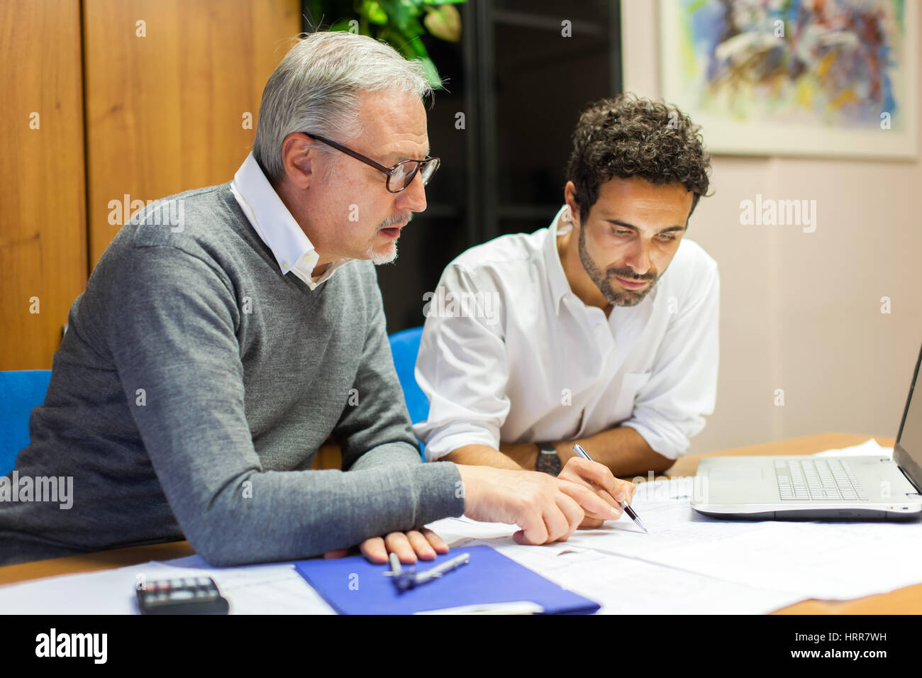 People at work in their office Stock Photo - Alamy