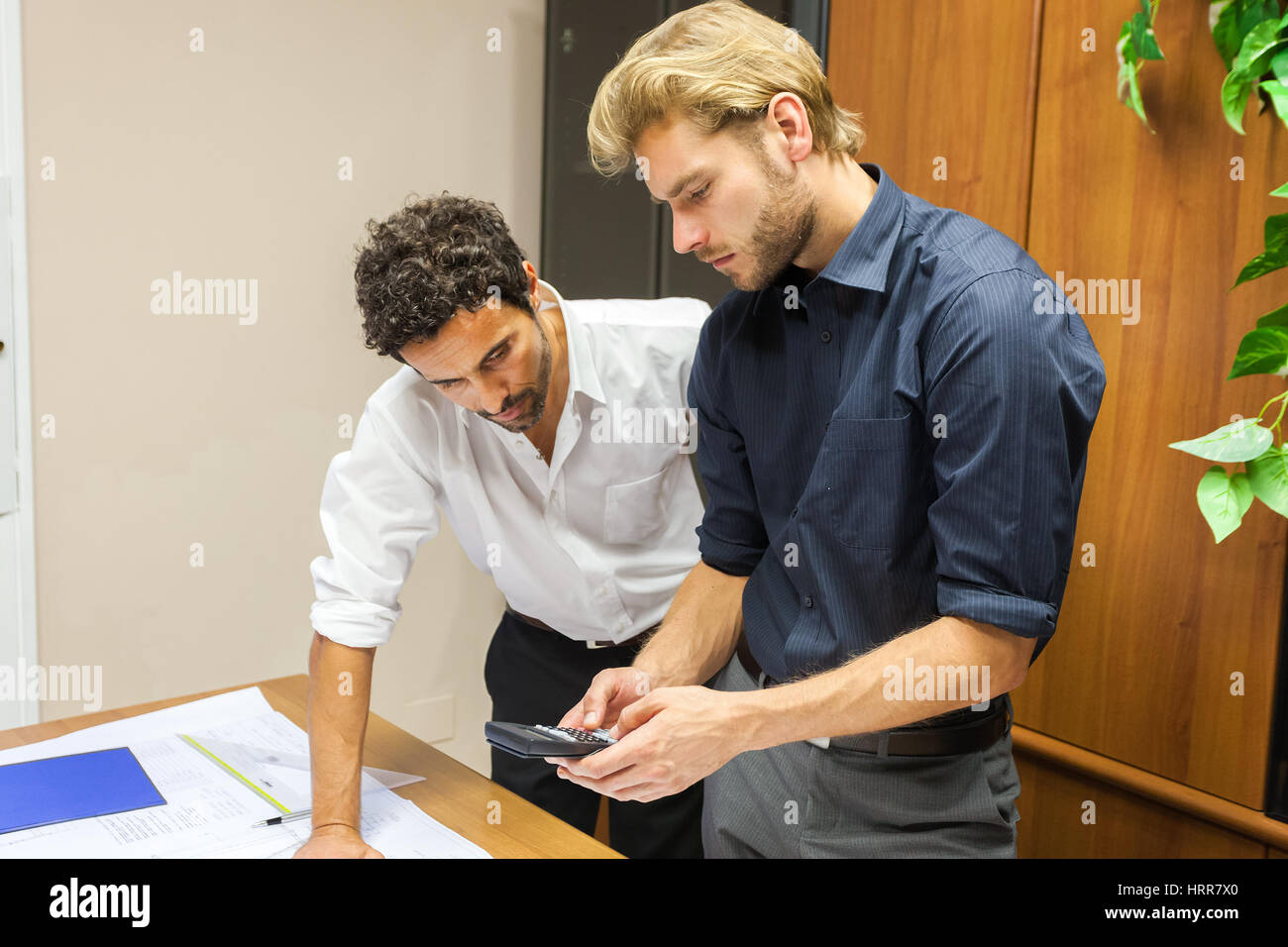 People at work in their office Stock Photo - Alamy