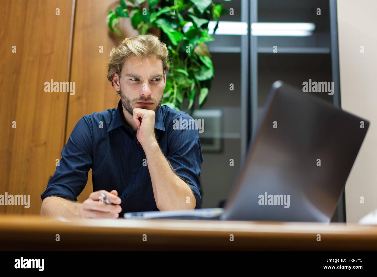 Two employees at work in an office Stock Photo - Alamy