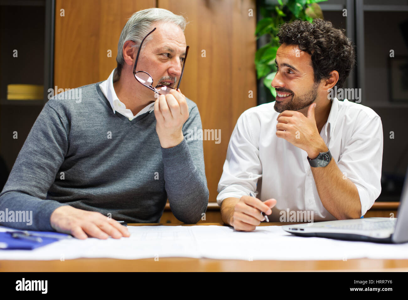 Two employees at work in an office Stock Photo - Alamy