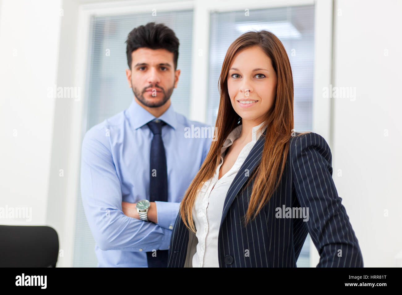 Smiling business people Stock Photo - Alamy