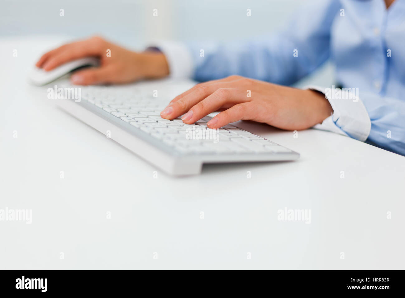 male hands typing on a laptop Stock Photo - Alamy