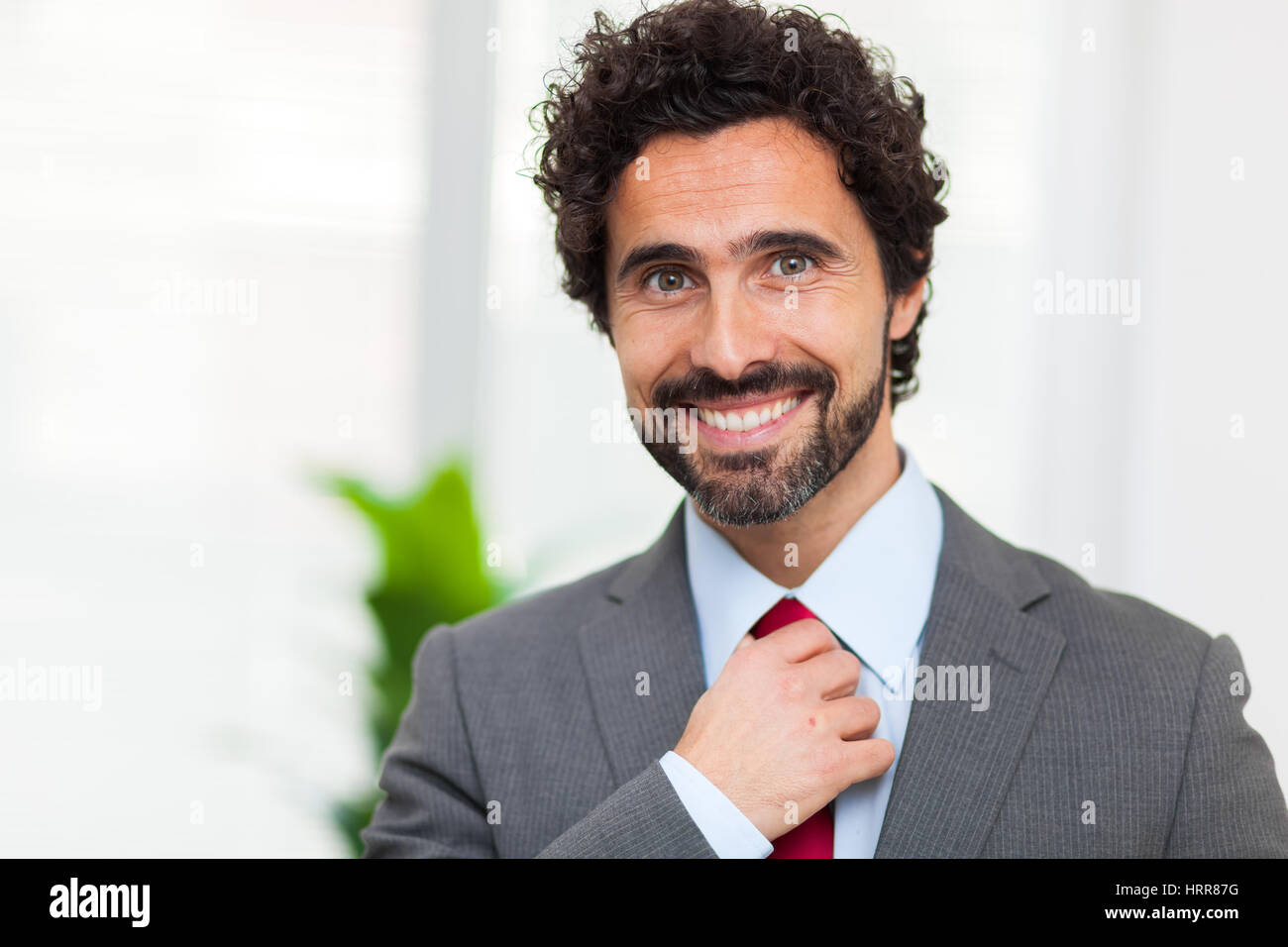 Handsome manager portrait Stock Photo - Alamy