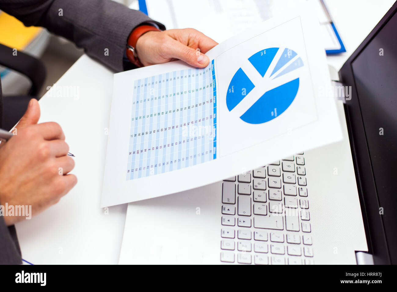 Businessman analyzing charts Stock Photo - Alamy Businessman analyzing charts Stock Photo - Alamy