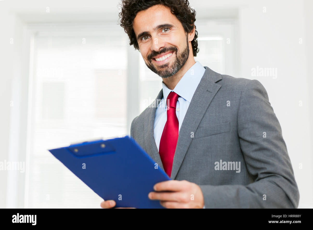 Male manager in the office Stock Photo - Alamy