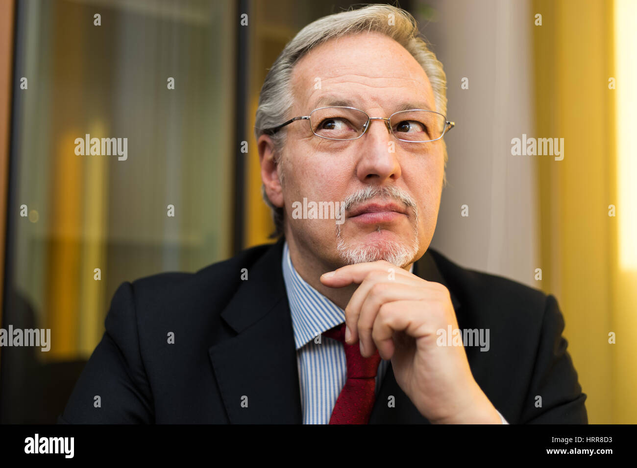 Pensive decision making for isolated person hi-res stock photography ...