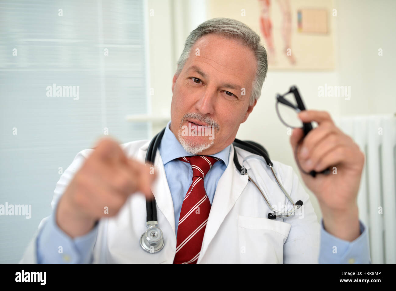 Doctor pointing his finger to you Stock Photo - Alamy