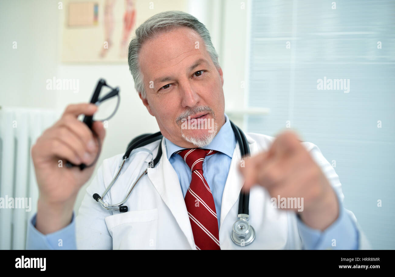 Doctor pointing his finger to you Stock Photo - Alamy