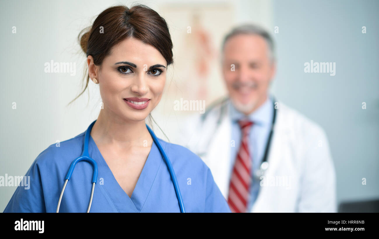 Doctor and nurse in a medical studio Stock Photo - Alamy