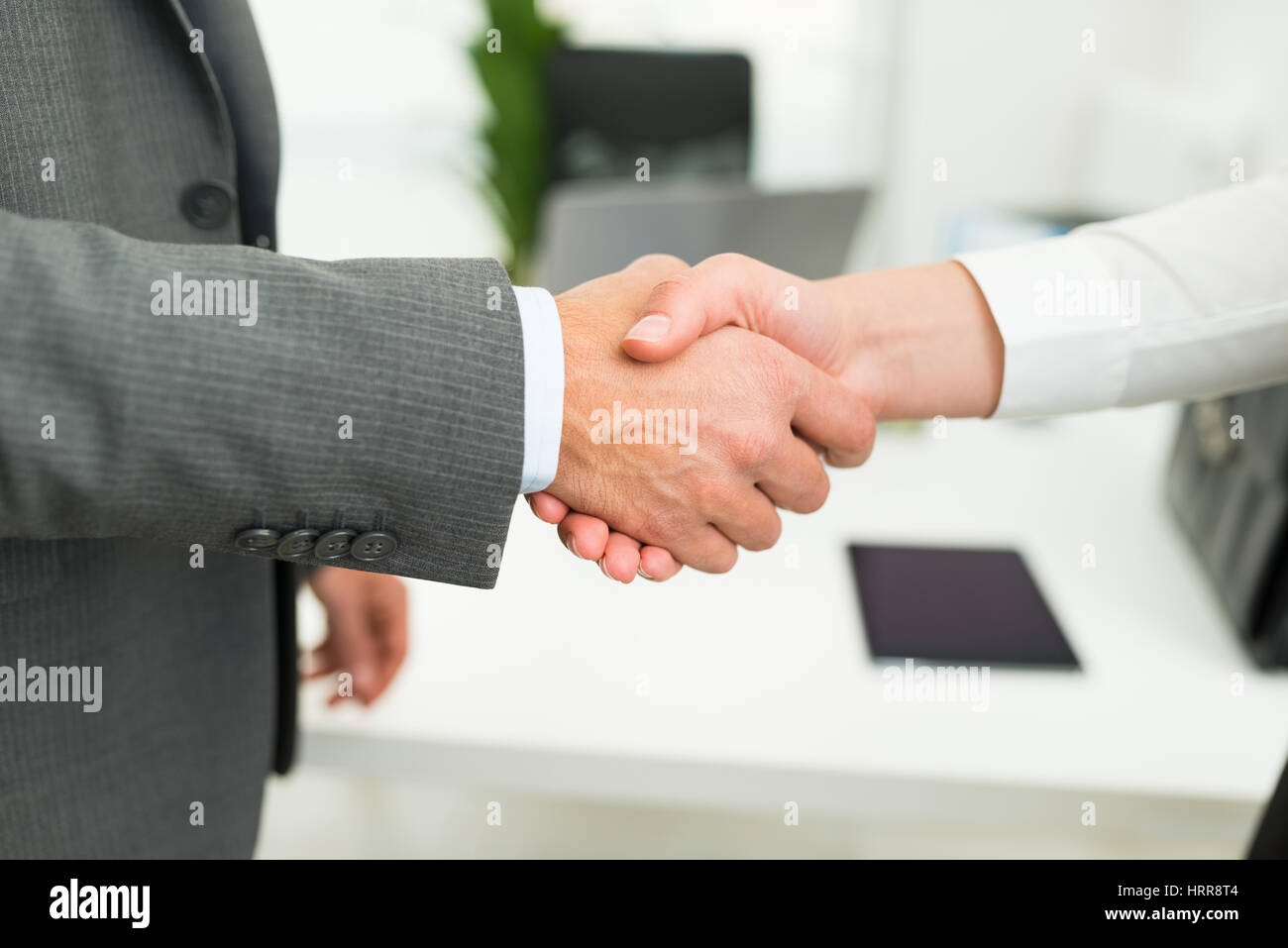 Business people shaking hands Stock Photo - Alamy