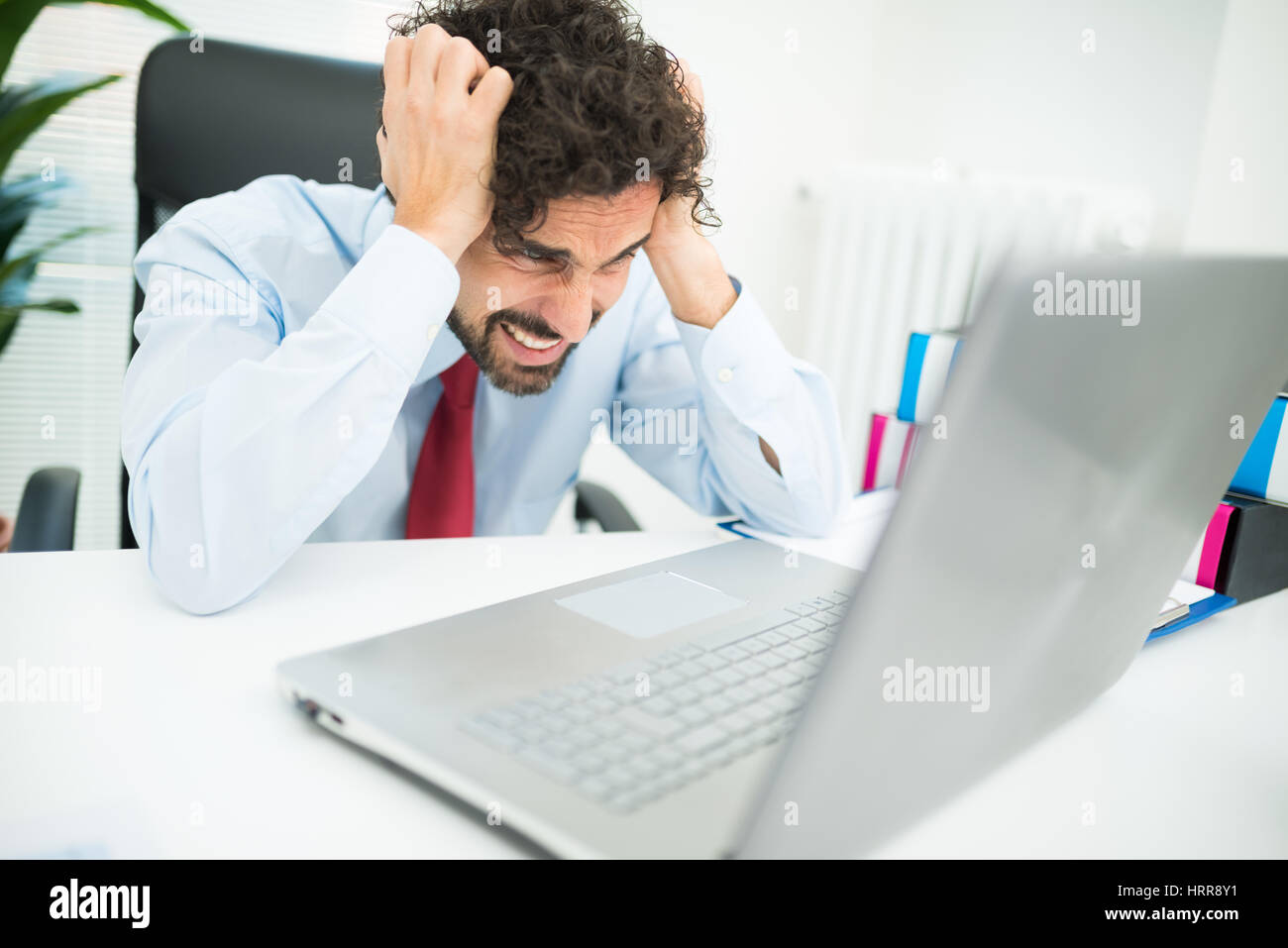 Computer problems angry businessman hi-res stock photography and images ...