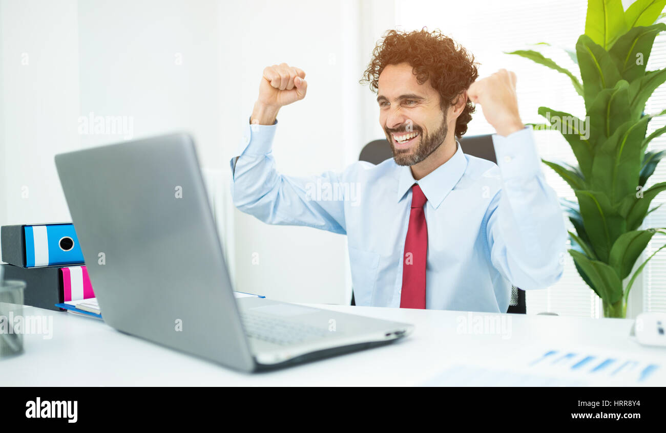 Very happy businessman portrait Stock Photo - Alamy