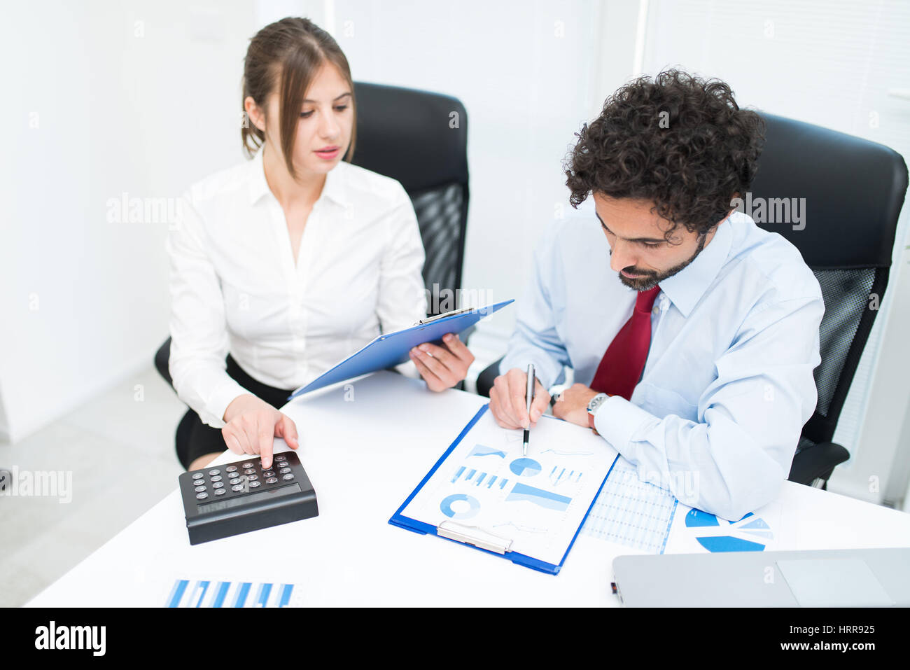 People at work in their office Stock Photo - Alamy