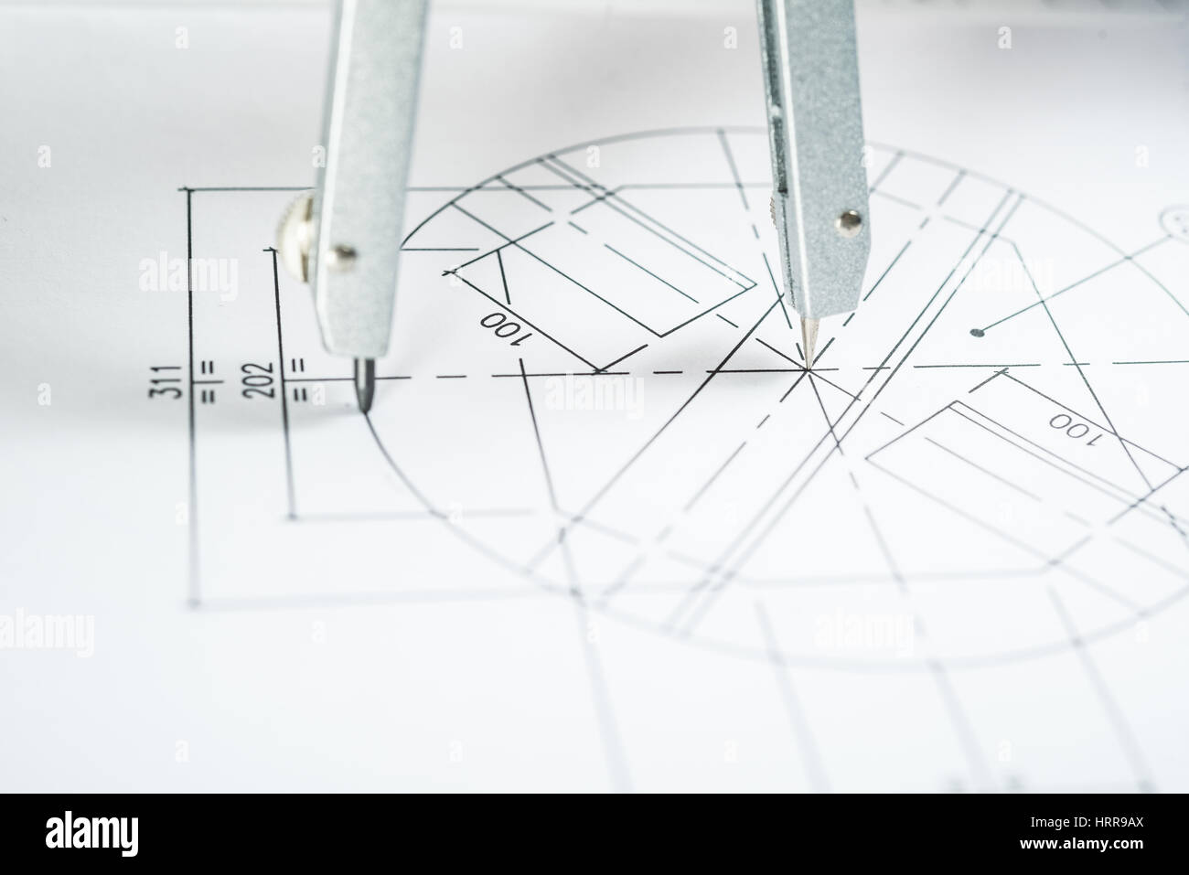 Macro shot of a compass on a technical drawing Stock Photo - Alamy