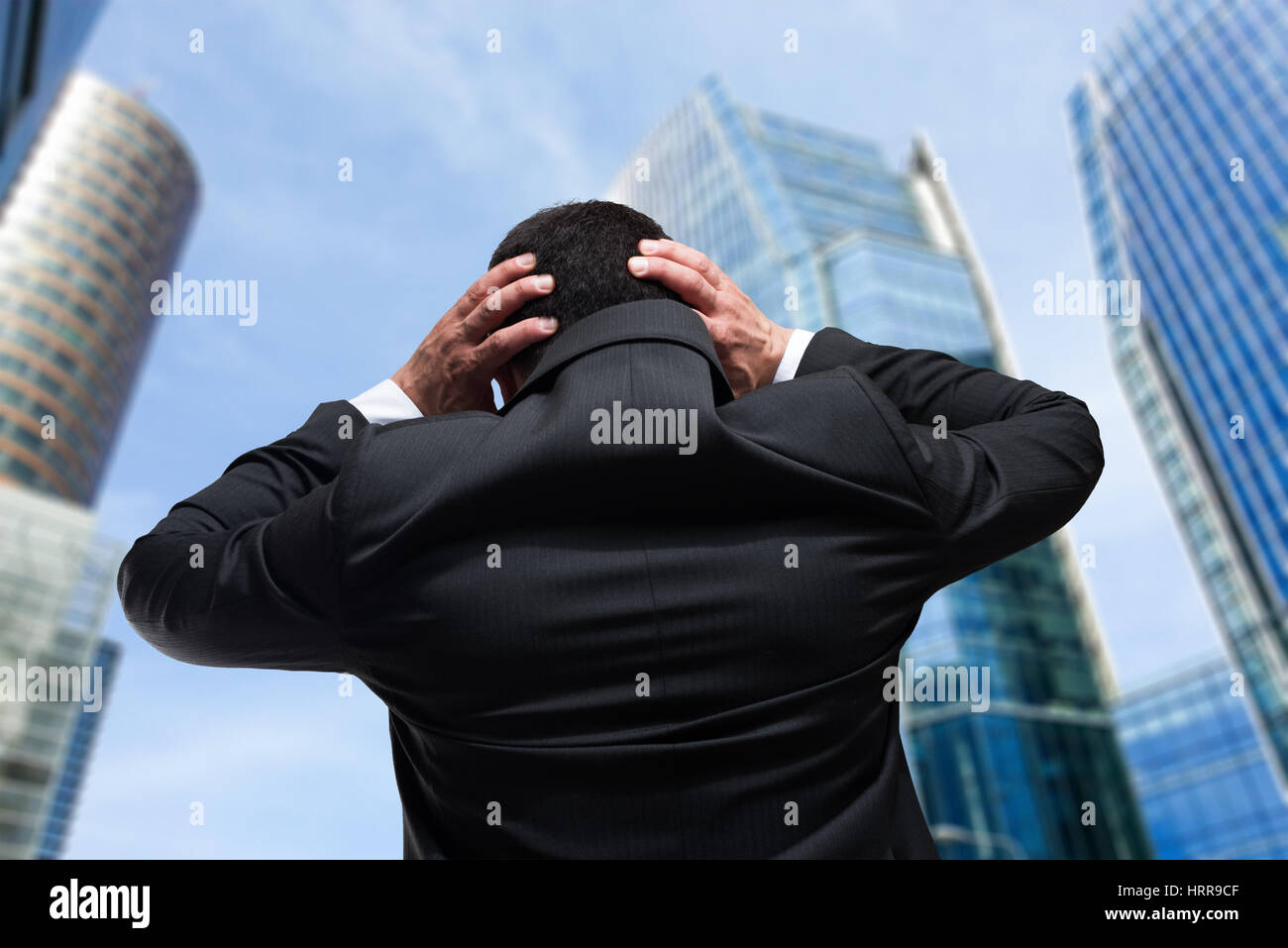 Desperate businessman in a big city Stock Photo - Alamy