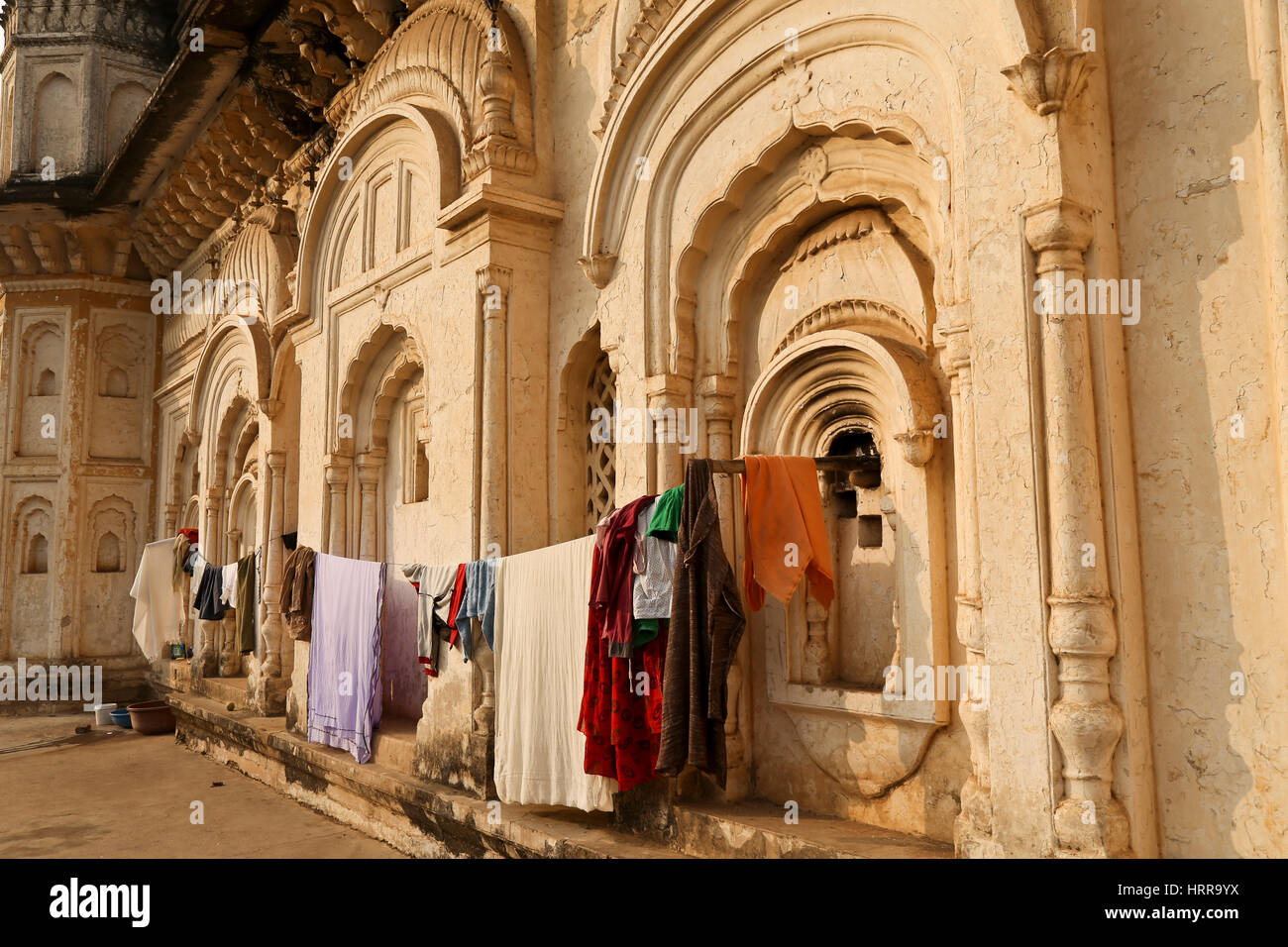Clothing hanging for drying outside a old Stock Photo - Alamy