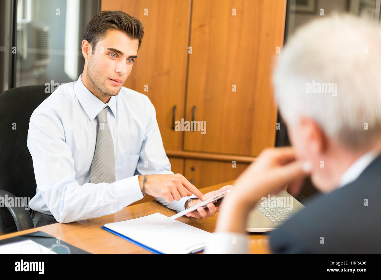 Business people at work in their office Stock Photo - Alamy