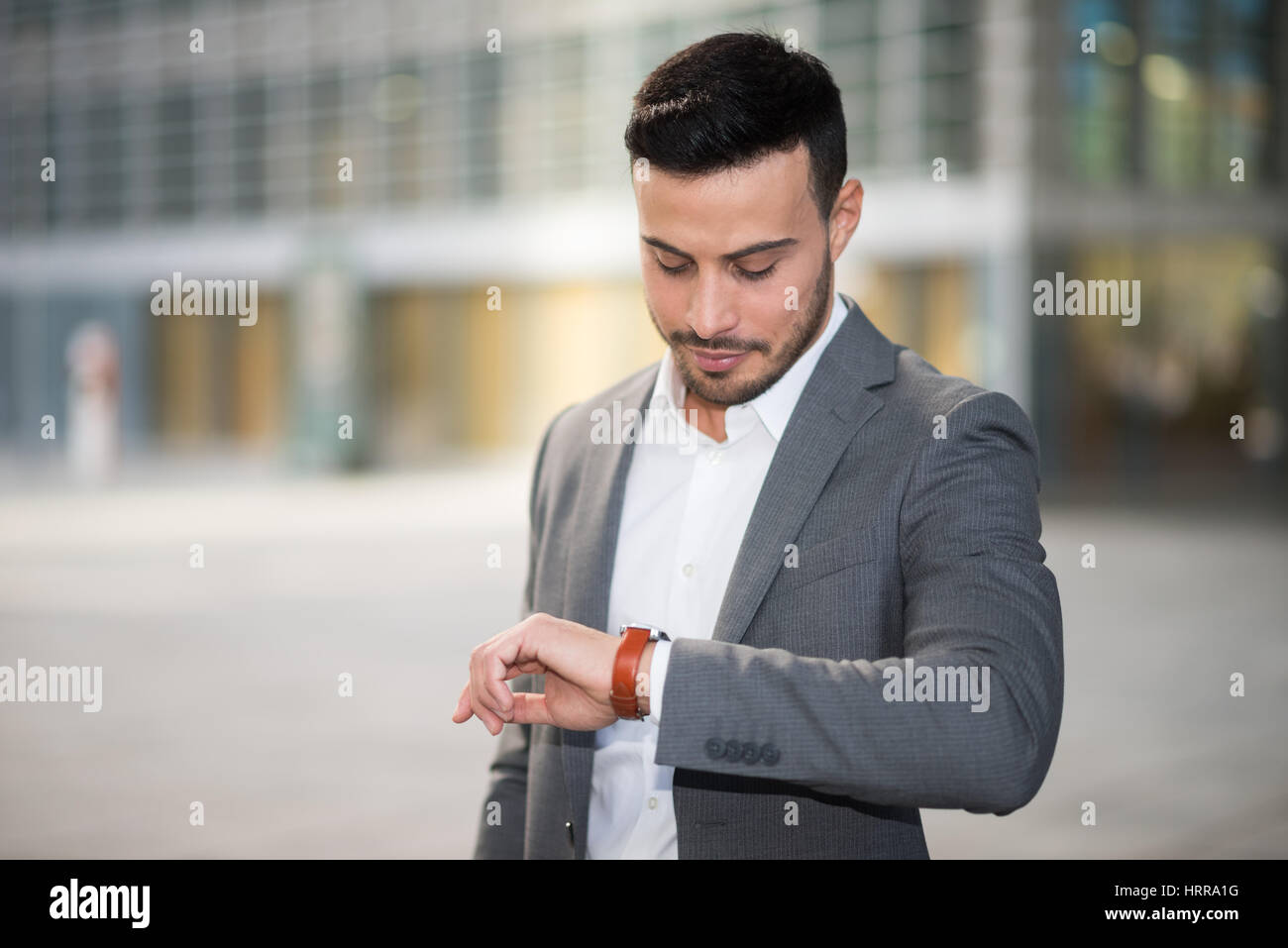 Person pointing watch wrist hi-res stock photography and images - Alamy
