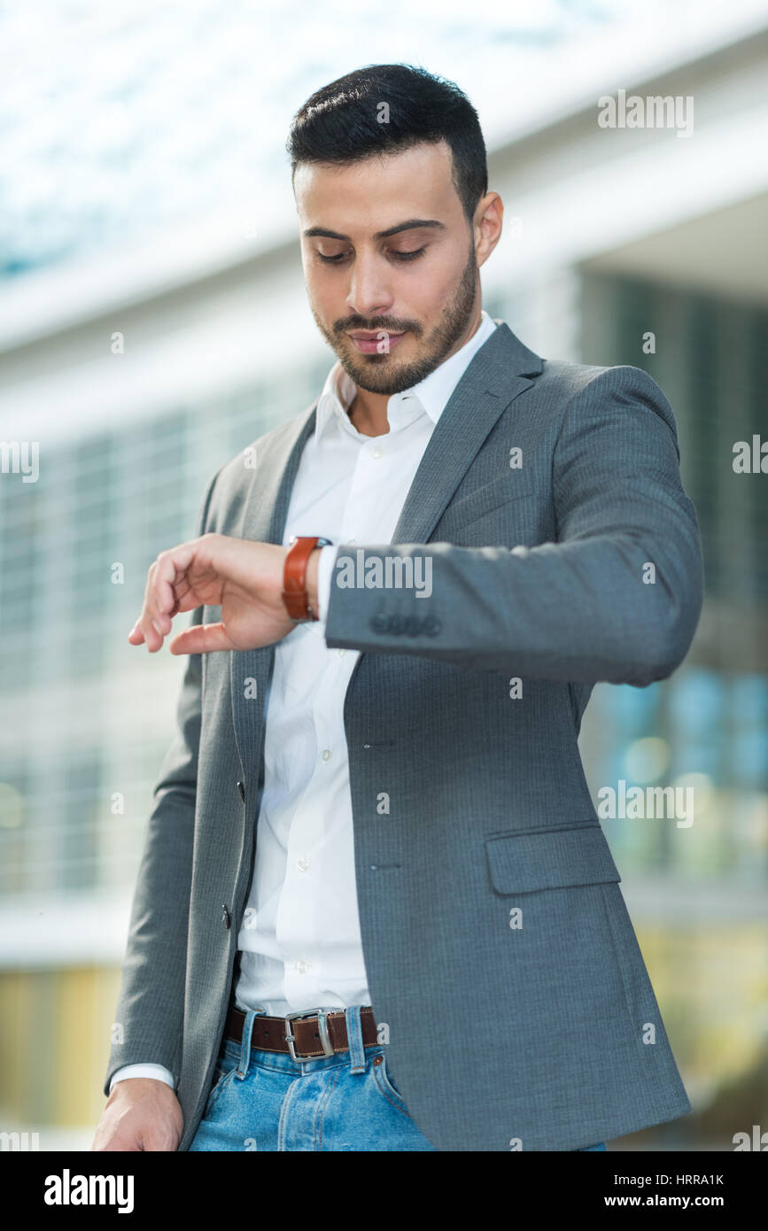 Watching his watch hi-res stock photography and images - Alamy