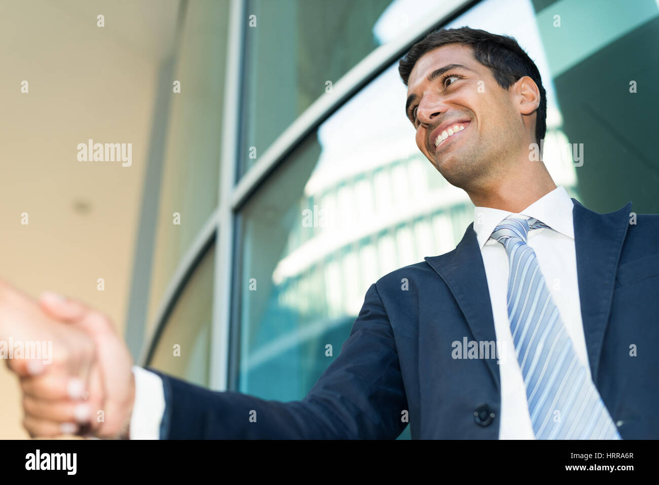 Business people shaking their hands Stock Photo - Alamy