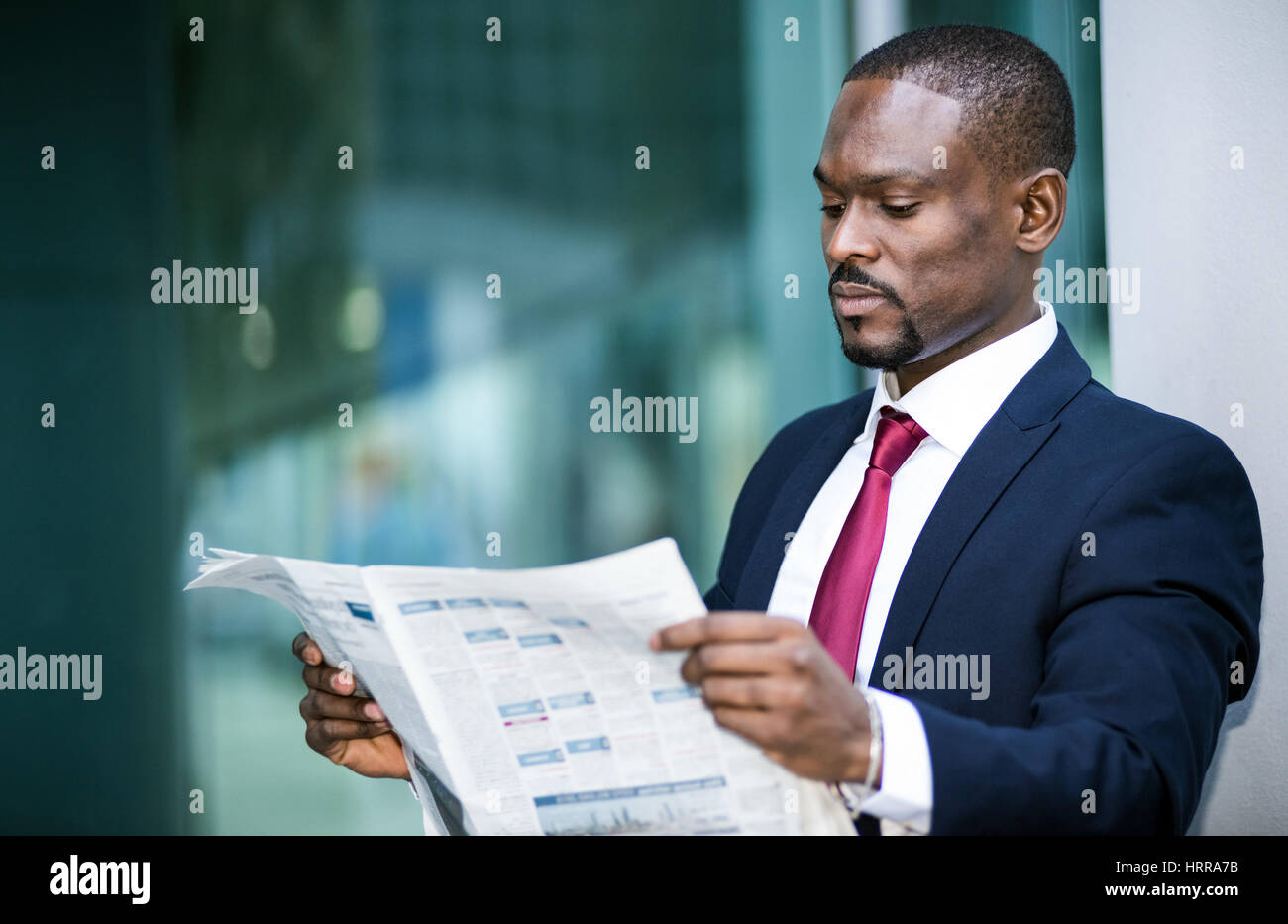 African american reading newspaper hi-res stock photography and images ...