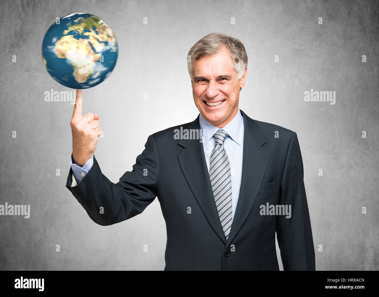 Hand spinning globe hi-res stock photography and images - Alamy
