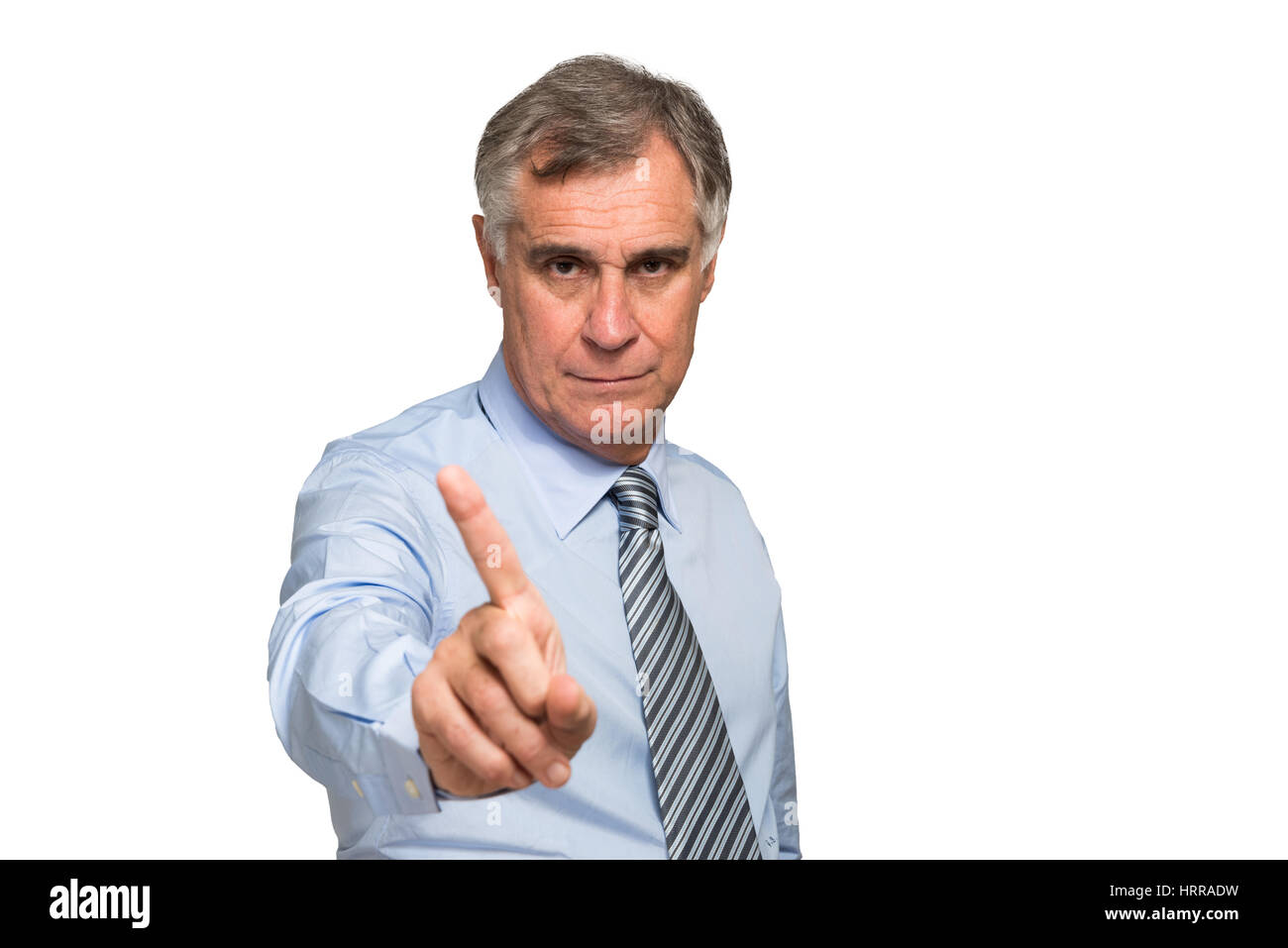 Businessman showing no sign against a white background Stock Photo - Alamy