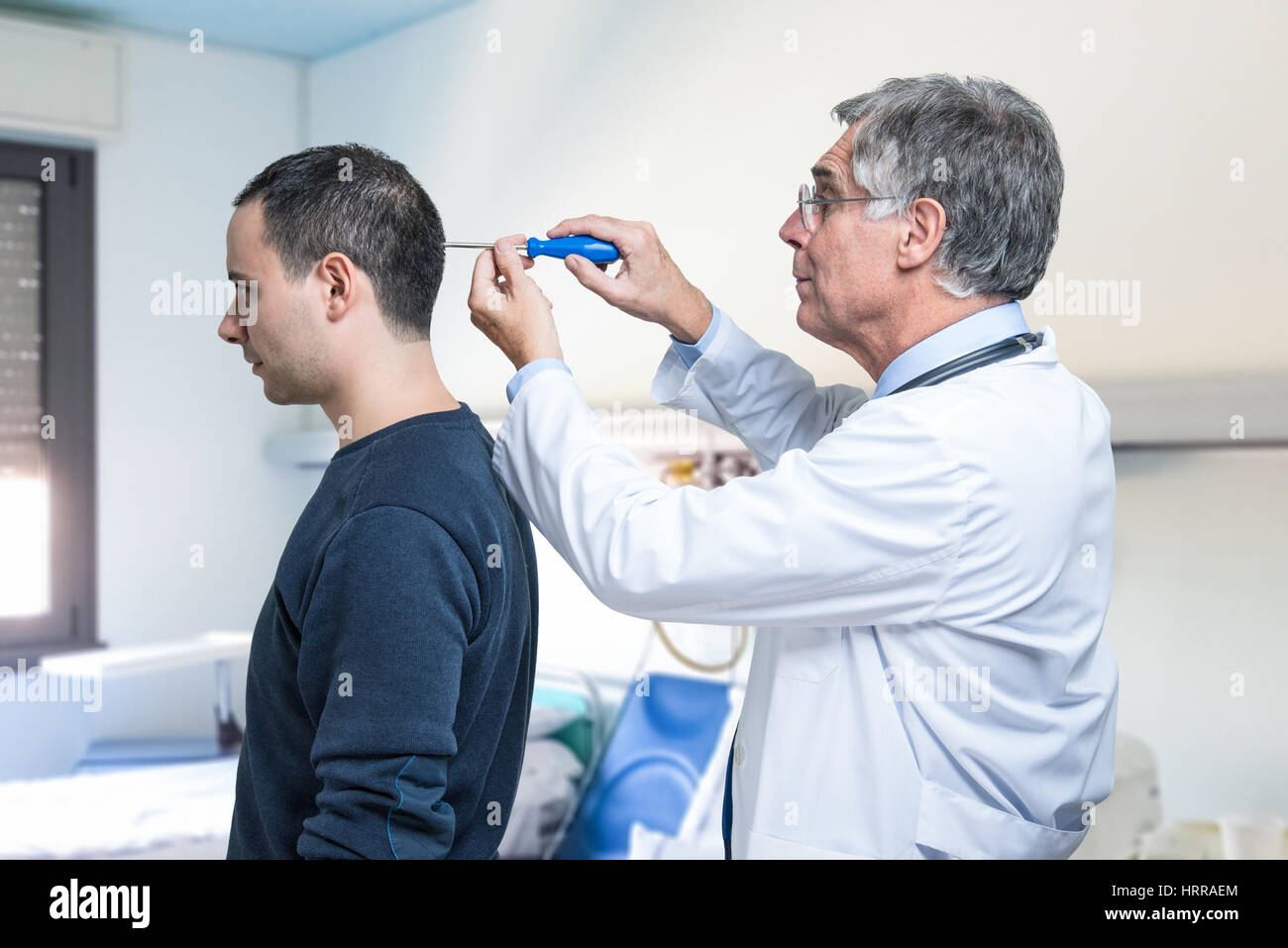 Doctor repairing the brain of a patient Stock Photo - Alamy