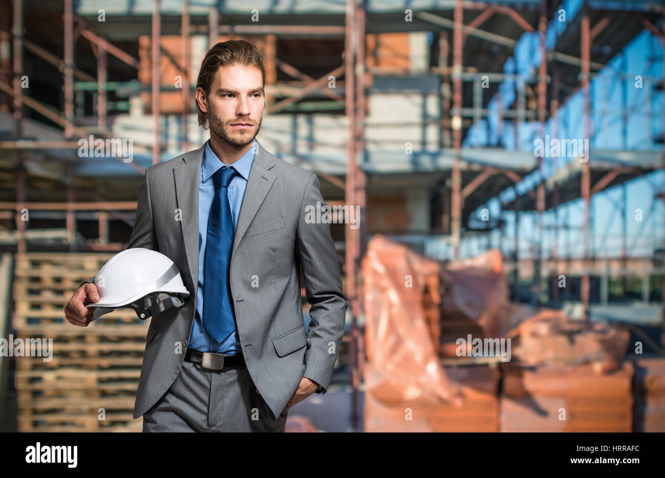 Portrait of an architect in front of a construction site Stock Photo ...