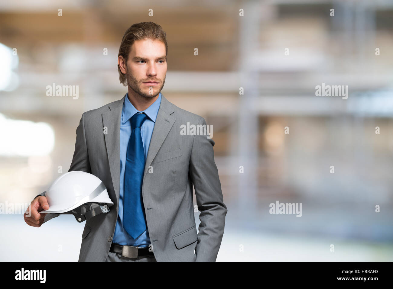 Portrait of an architect in front of a construction site Stock Photo ...