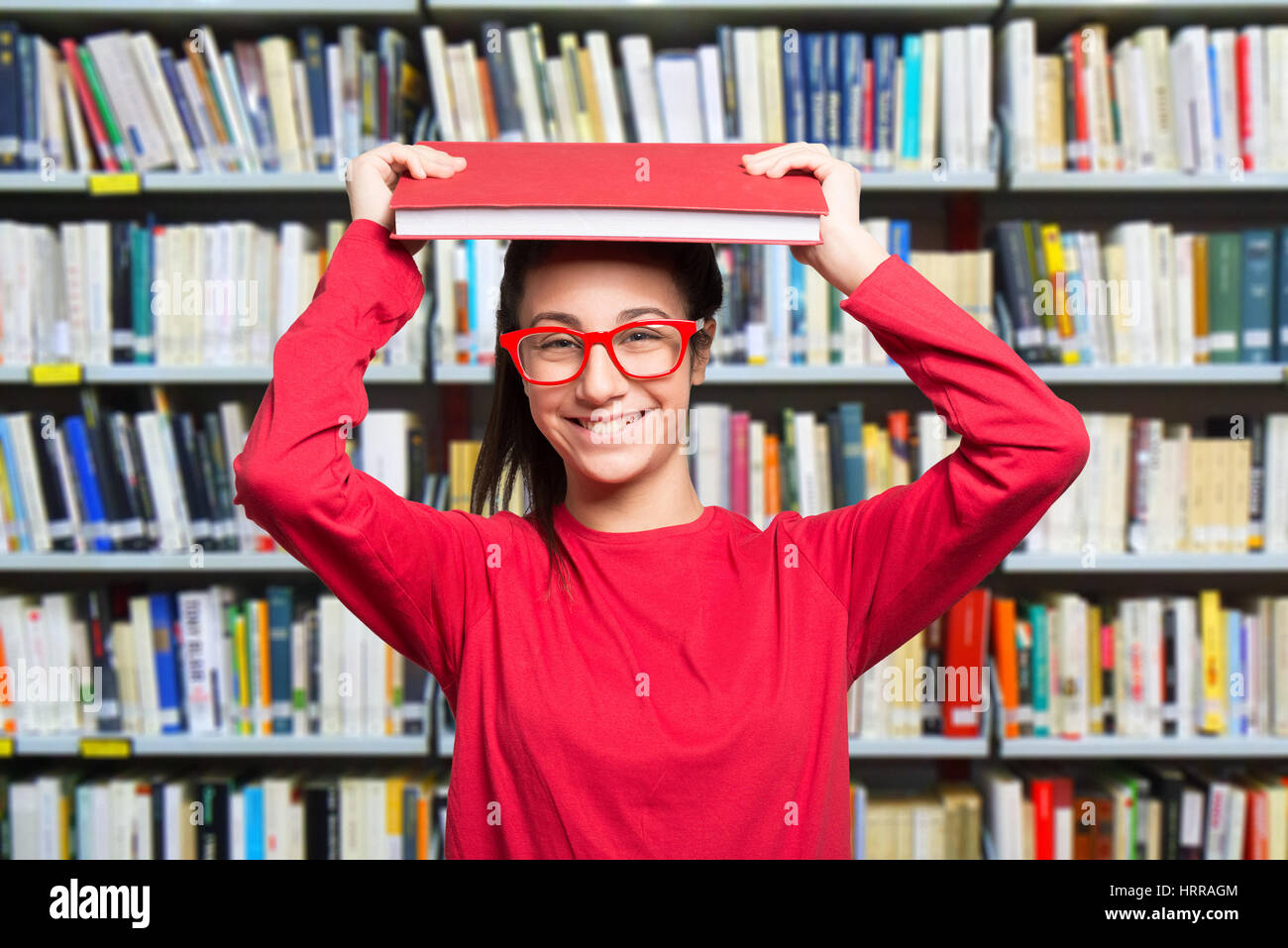 Teen girl book smiling hi-res stock photography and images - Alamy