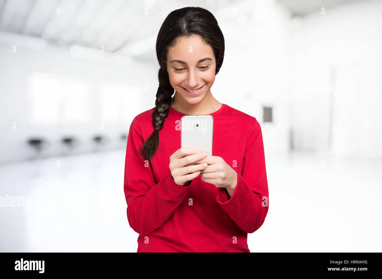 Teenager using their mobile phone hi-res stock photography and images ...