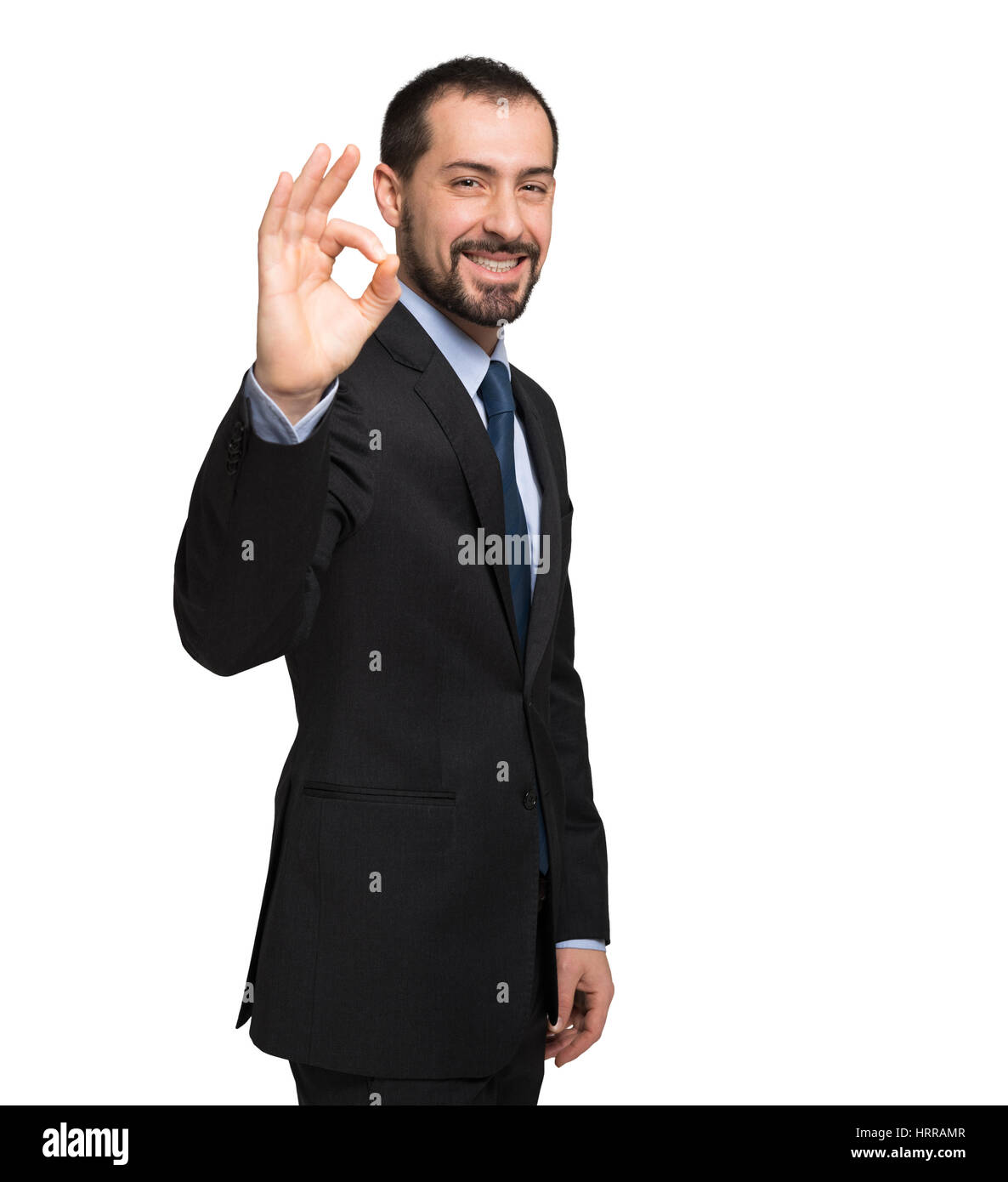 Smiling businessman making alright sign Stock Photo - Alamy
